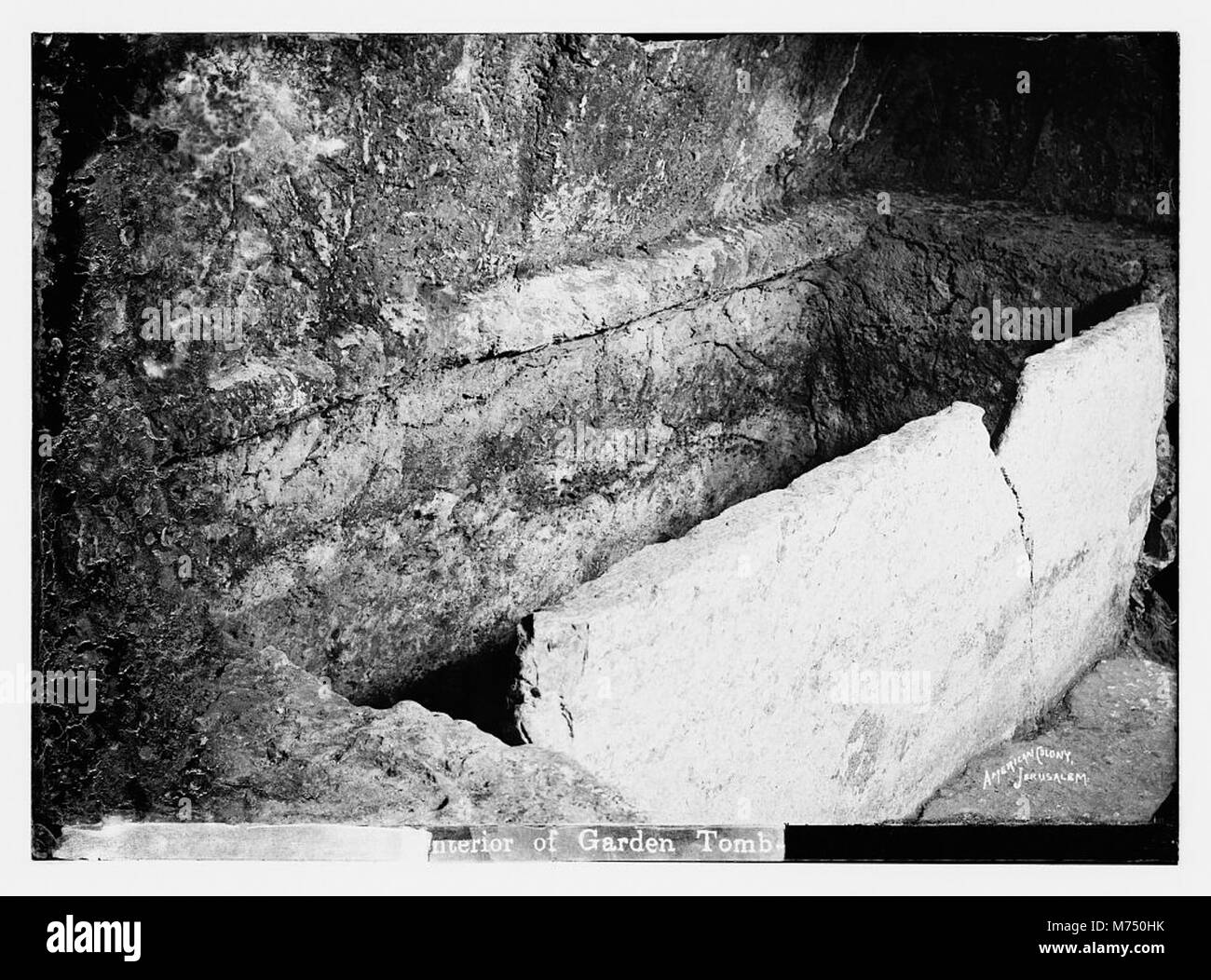 The image depicts the interior of the Garden Tomb, a significant ...