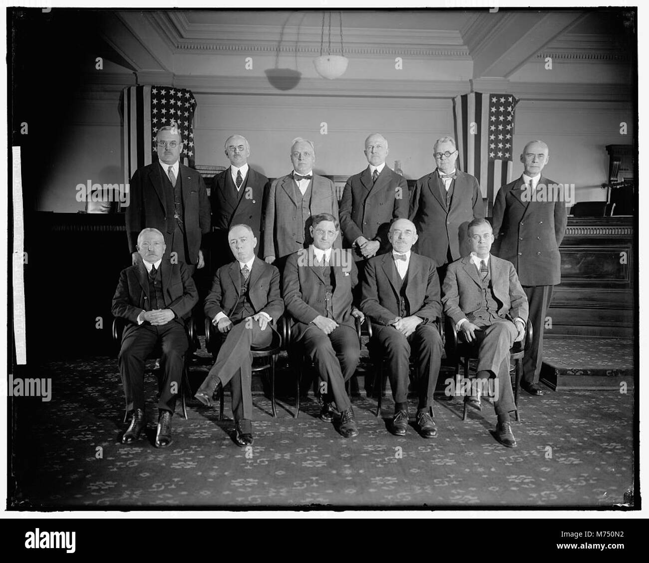 A photograph showing the members of the Interstate Commerce Commission ...