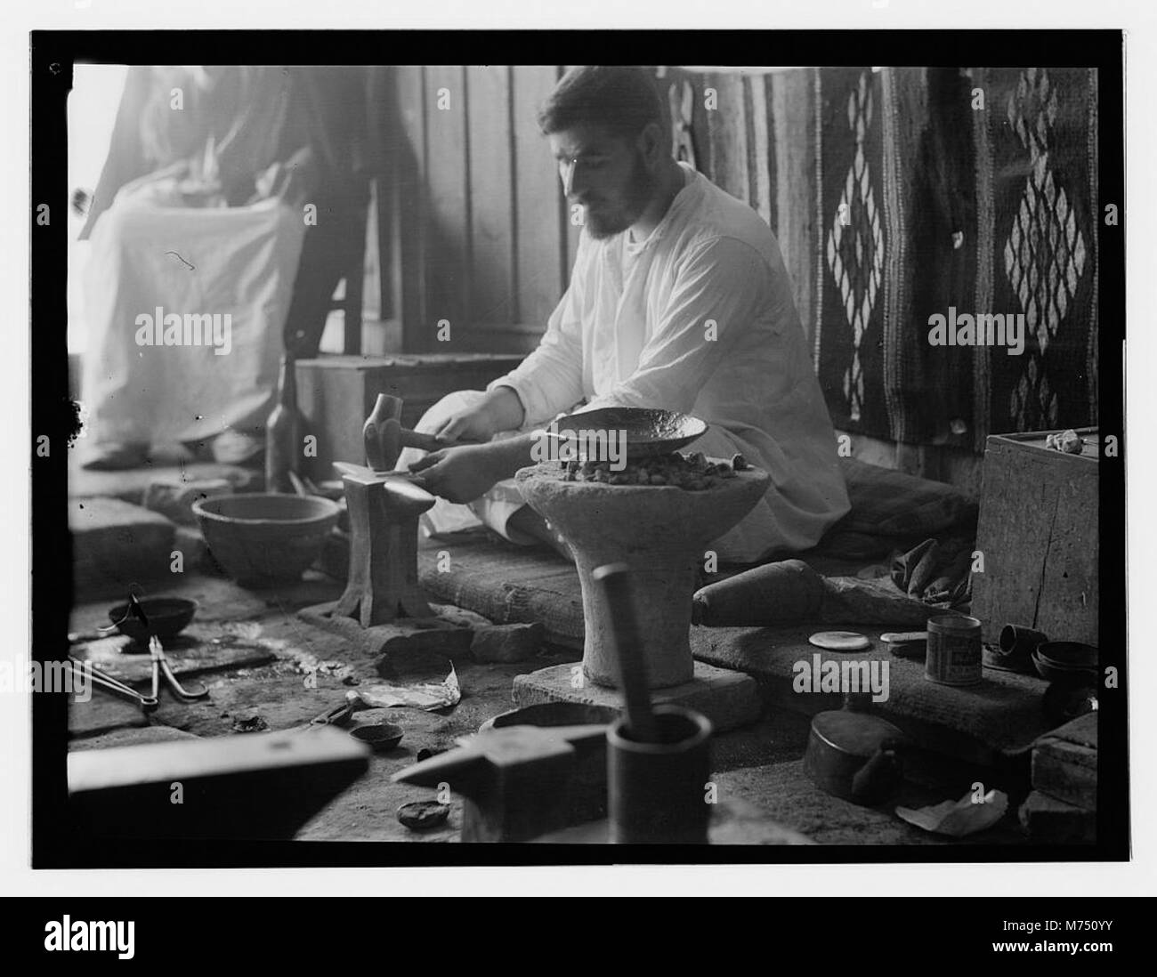 Blacksmith working on anvil in Black and White Stock Photos & Images ...