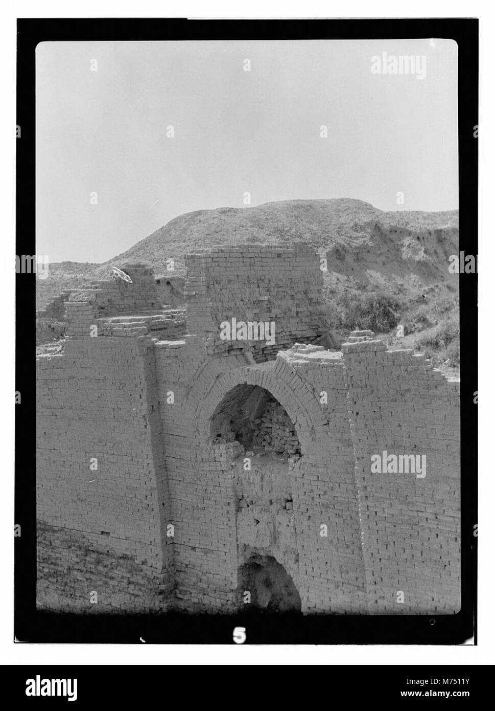 A photograph showcasing the ancient ruins in Iraq. The image highlights ...
