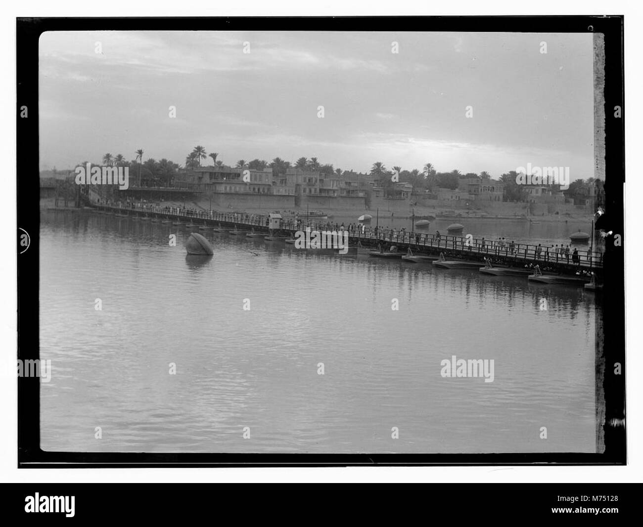 This image shows the Tigris River in Baghdad, Iraq, with a view of the ...