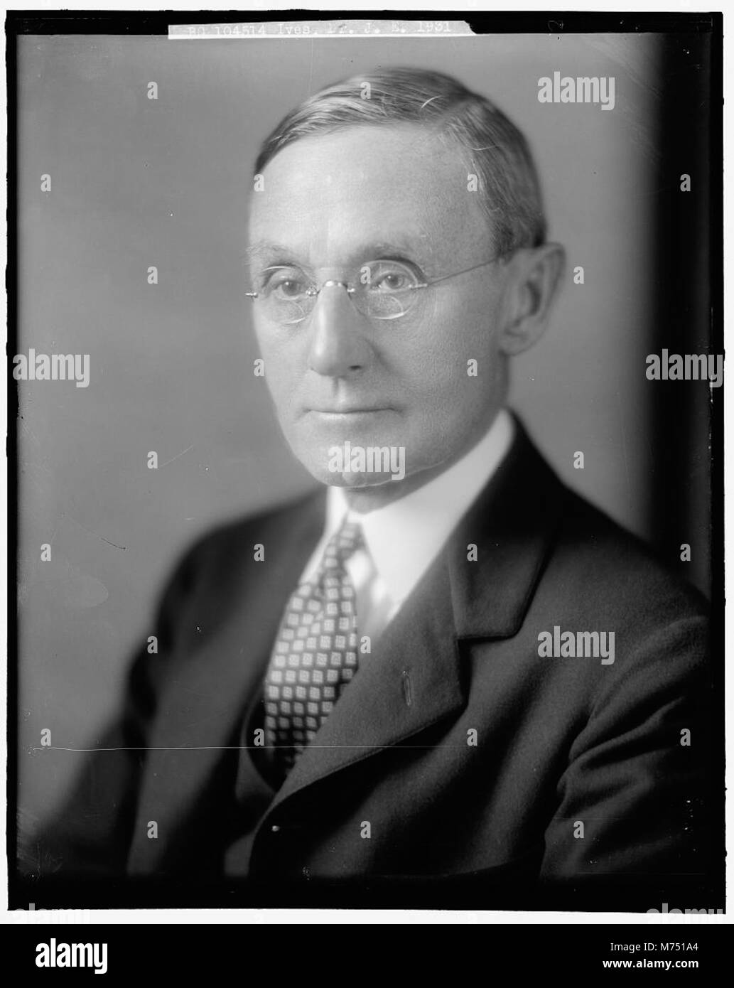 A professional portrait or photograph of Dr. J.E. Ives, a medical ...