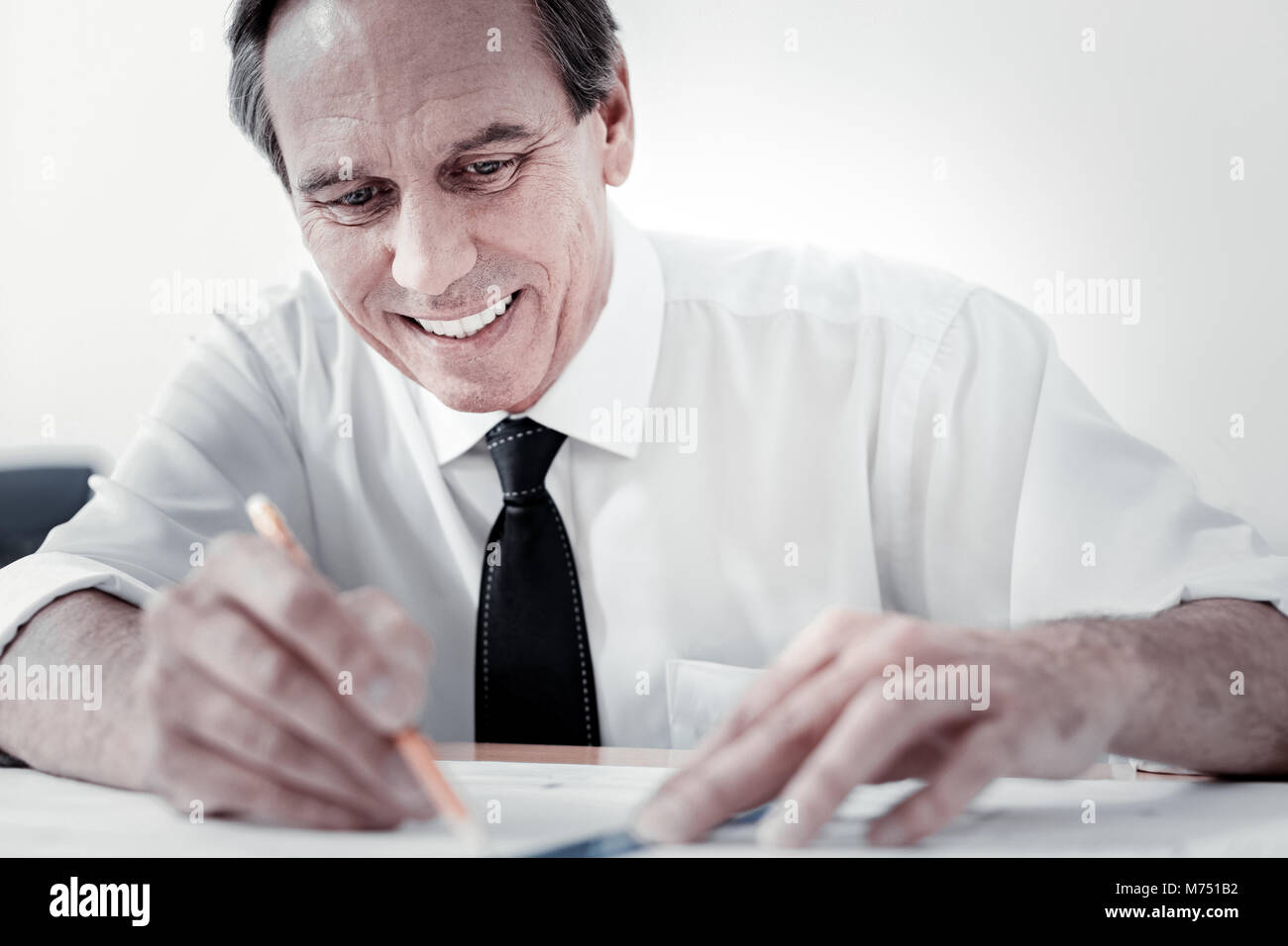 Portrait of busy architect that drawing sketch Stock Photo - Alamy