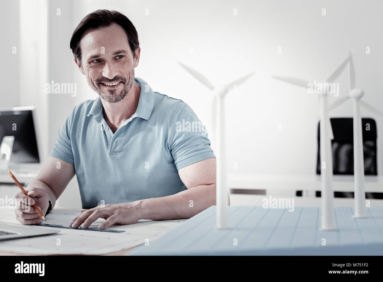 Confident male person going to draw straight line Stock Photo - Alamy