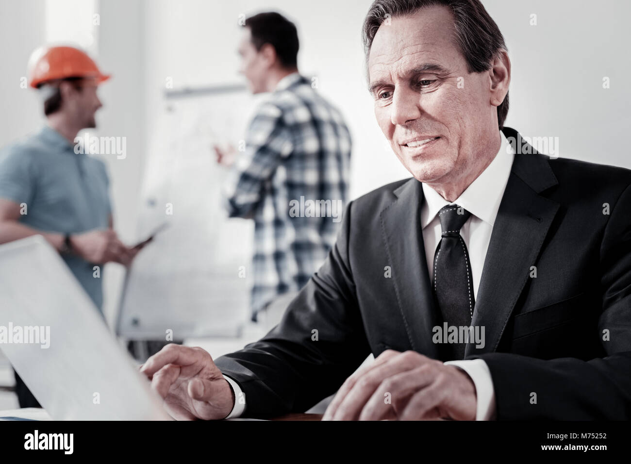 Thoughtful man looking at screen of his computer Stock Photo - Alamy