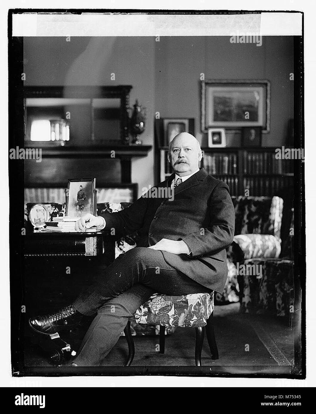 A formal portrait of Jn. W. Weeks, dated January 12, 1921, capturing ...