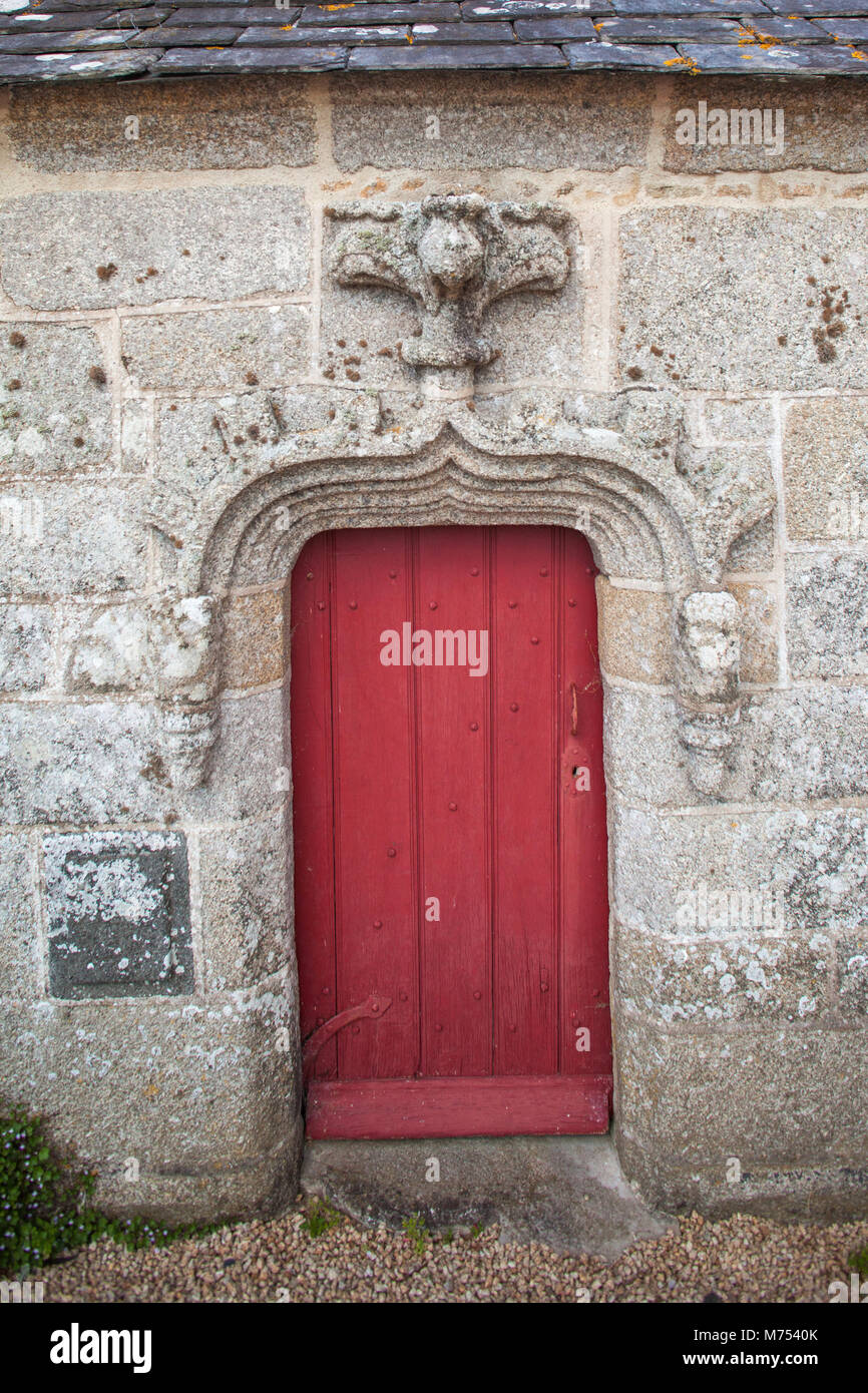 Old medieval decorative red doors Stock Photo - Alamy