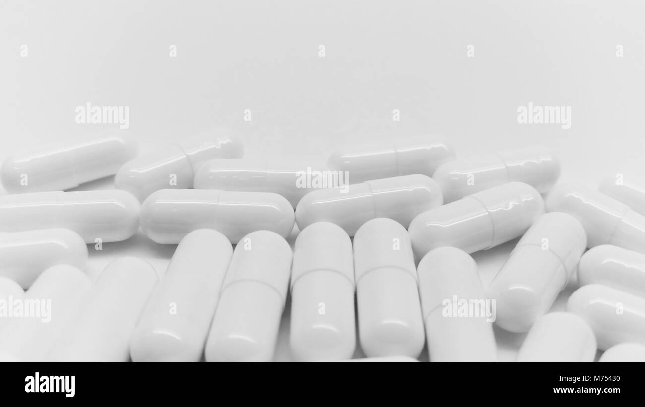 White capsules in the pharmacy laboratory Stock Photo - Alamy