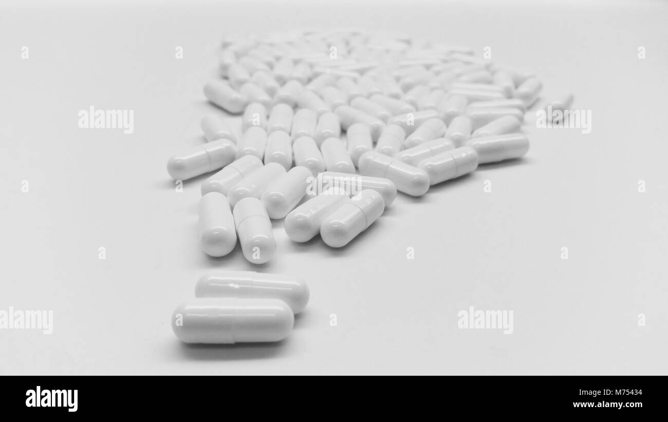 White capsules in the pharmacy laboratory Stock Photo - Alamy