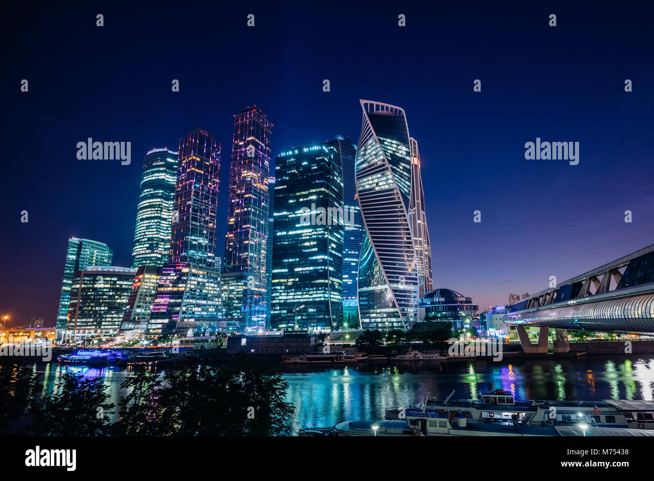 Night cityscape with Moscow City complex on the background of dark blue ...