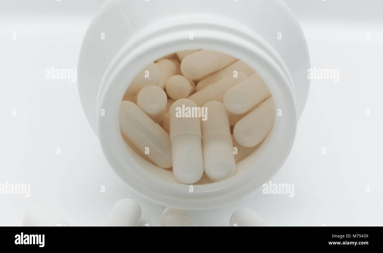 White capsules in the pharmacy laboratory Stock Photo - Alamy