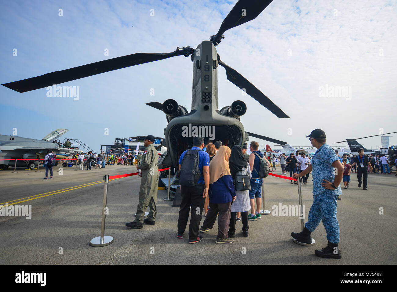 Singapore - Feb 10, 2018. Visitors looking at Boeing CH-47 Chinook ...