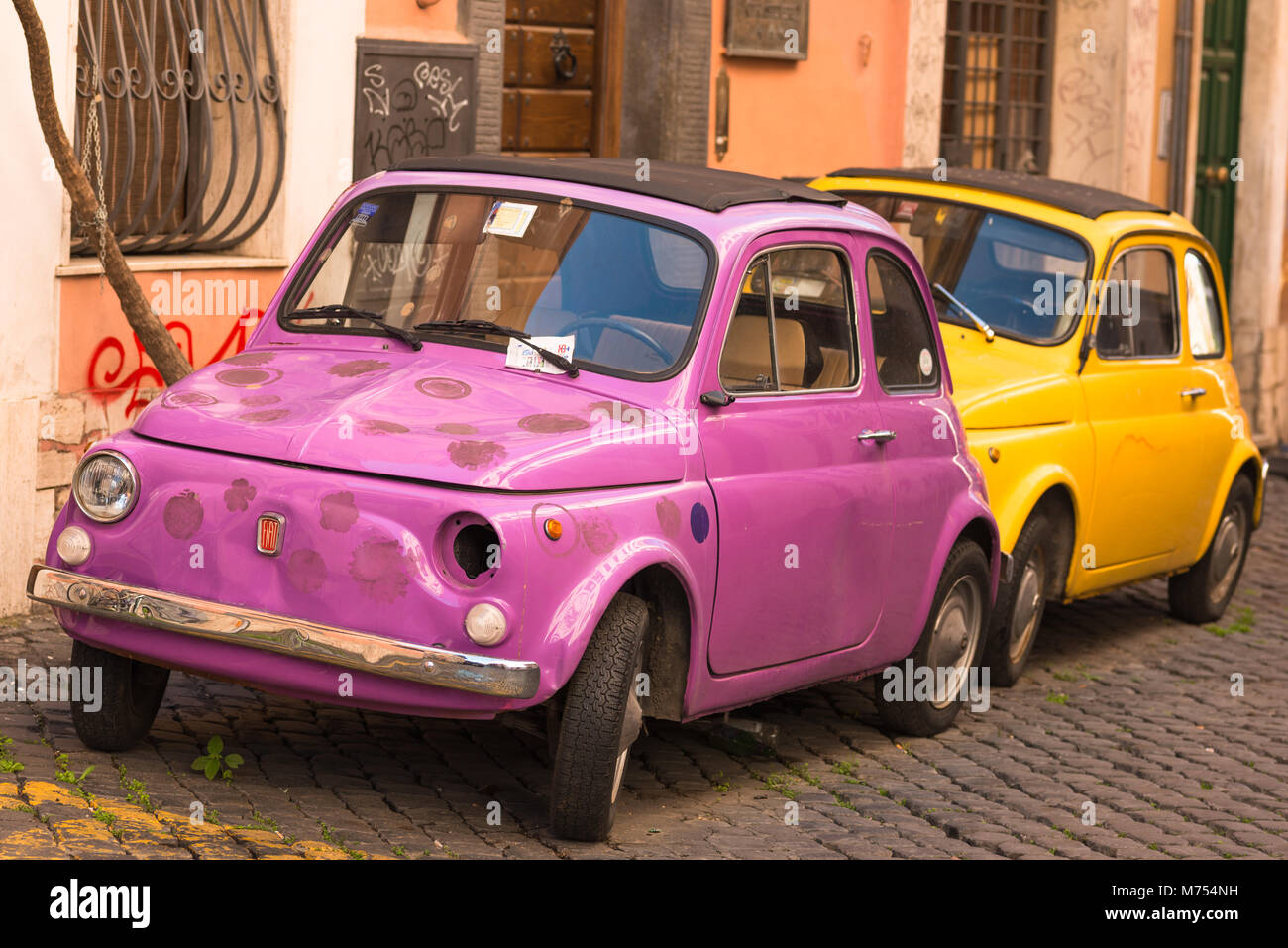 Two classic Fiat 500 cars parked on Trastevere backstreet, Rome, Lazio ...