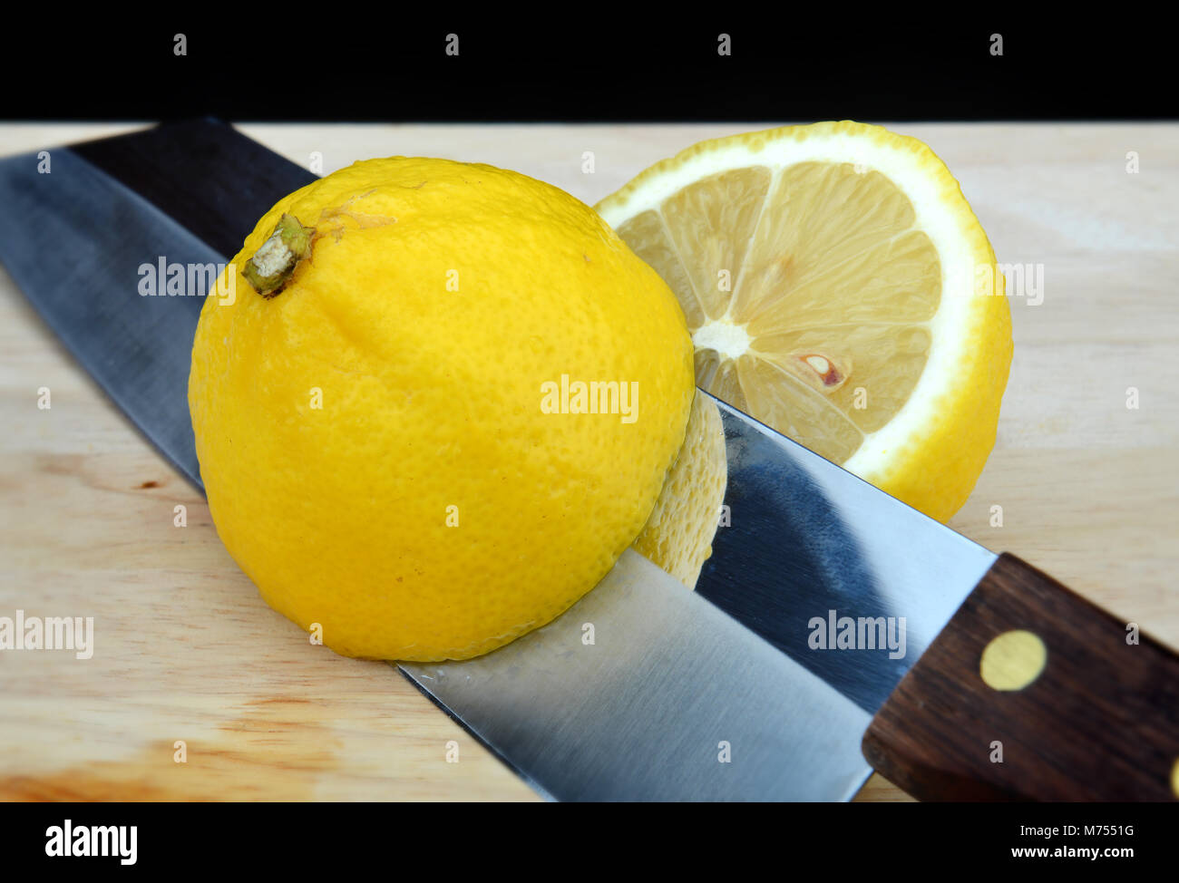 Half lemon knife hi-res stock photography and images - Alamy