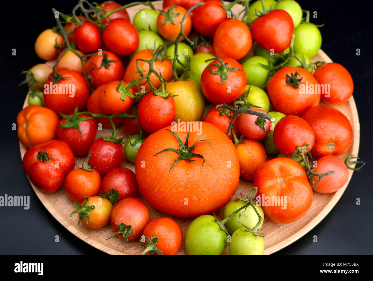 super beautiful fresh colorful tomato from nature farm Stock Photo - Alamy
