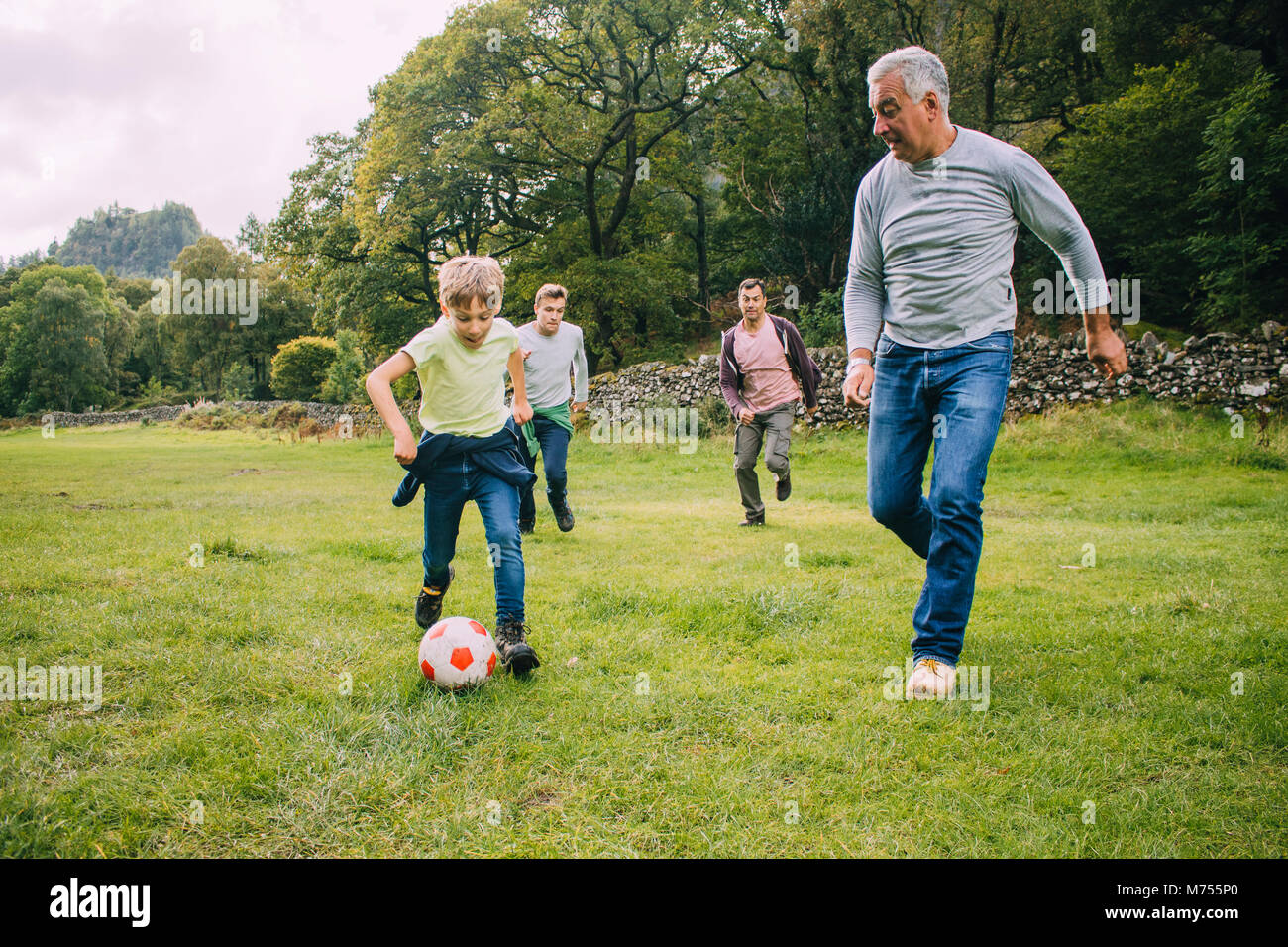 Football together hi-res stock photography and images - Alamy