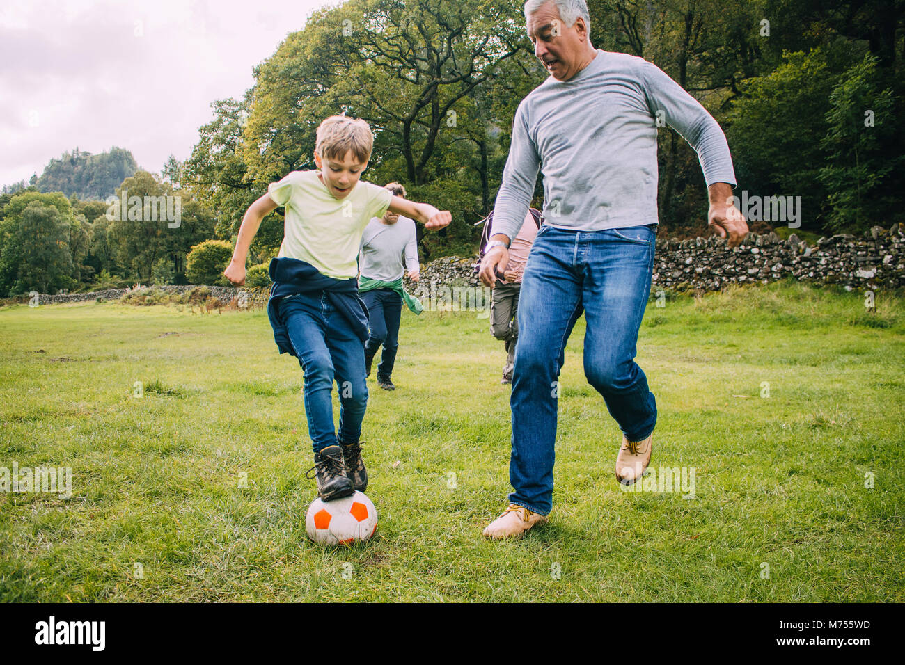 Football together hi-res stock photography and images - Alamy