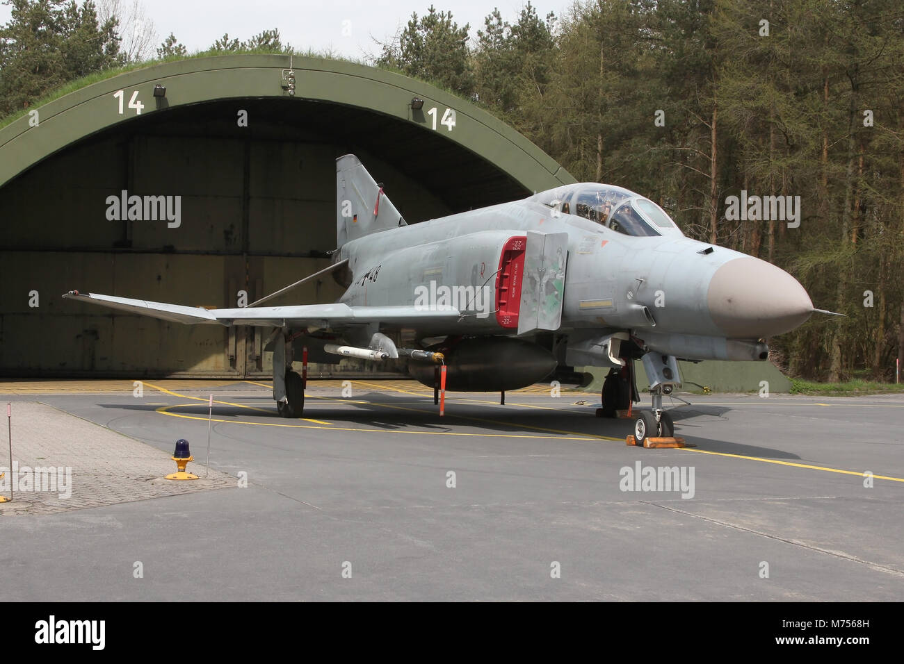 A Luftwaffe F-4F standing outside it's shelter at Wittmund airbase ...