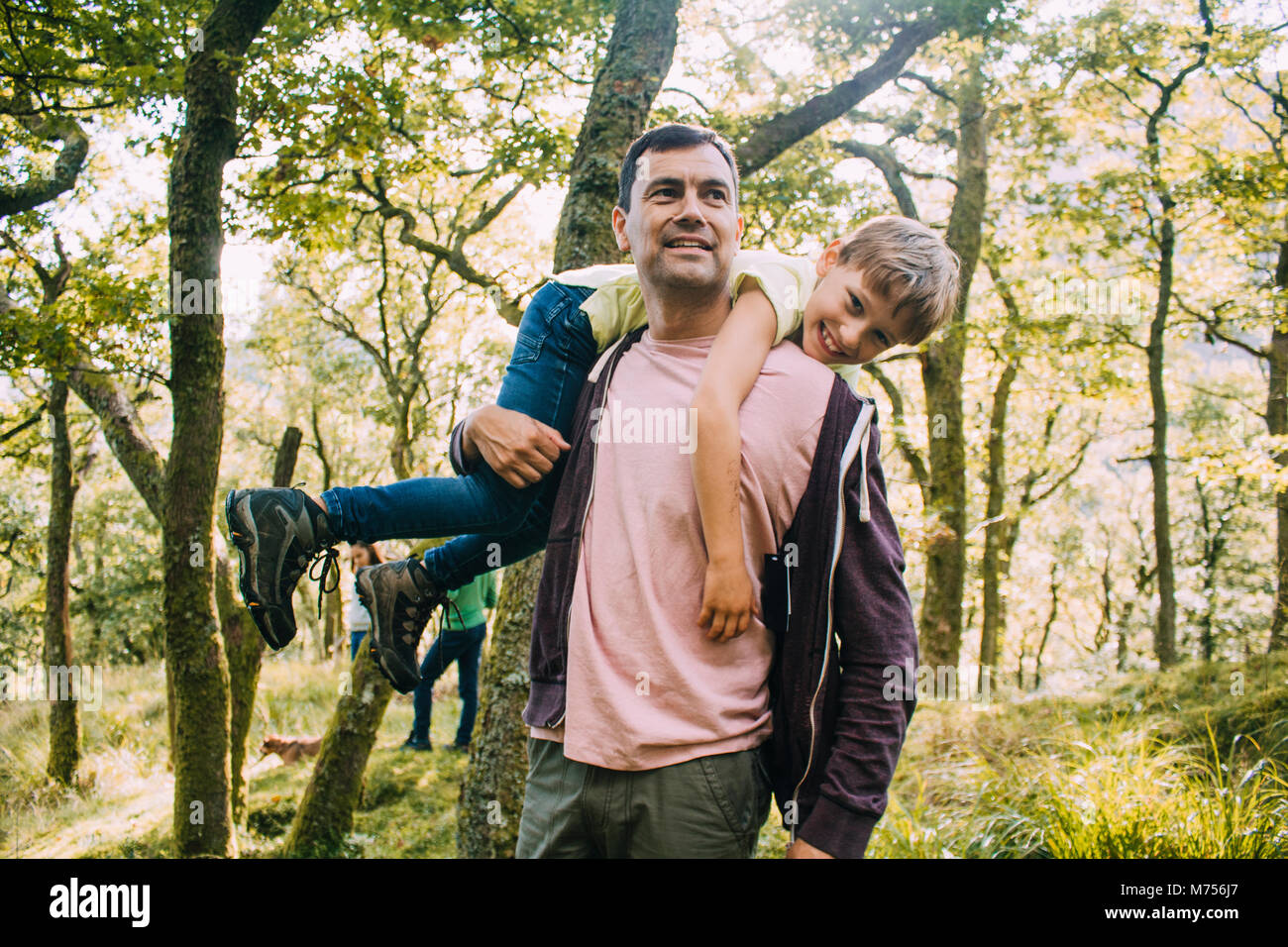 Holding carrying being carried hi-res stock photography and images - Alamy