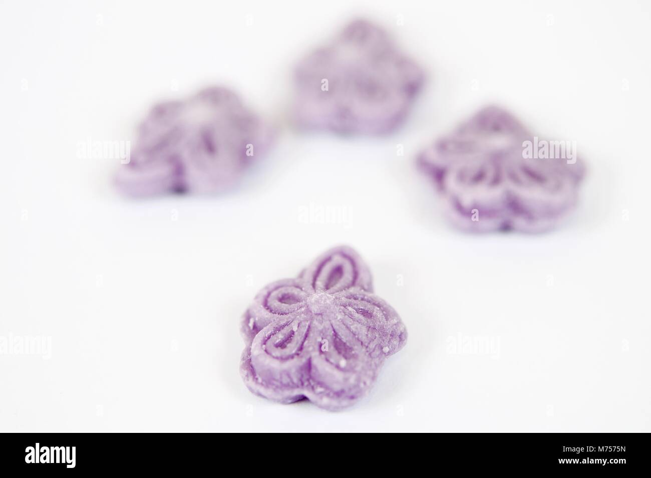 Violet candies hi-res stock photography and images - Alamy