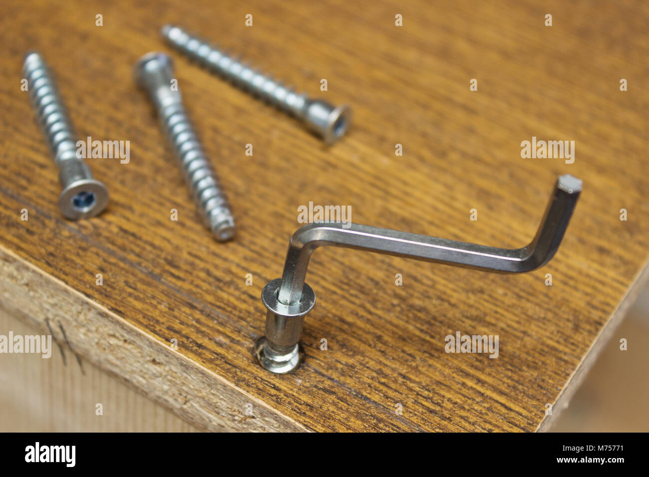 Tightening The Screws When Assembling Furniture With A Simple Tool
