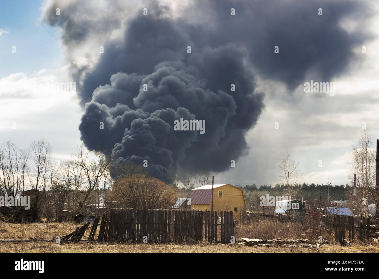 Observation of a strong black smoke from a distance Stock Photo - Alamy