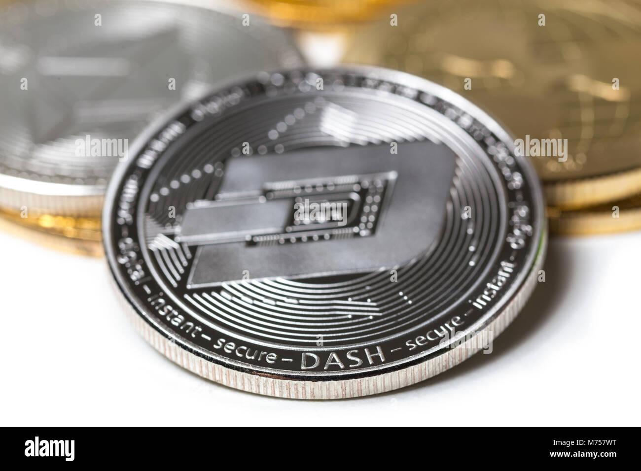 dash crypto coin in front of others Stock Photo - Alamy