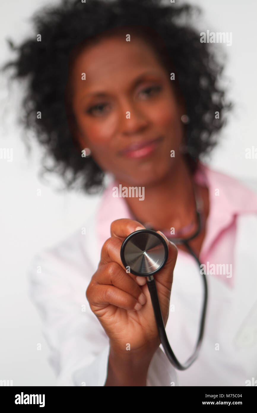Friendly African American doctor smiling Stock Photo - Alamy