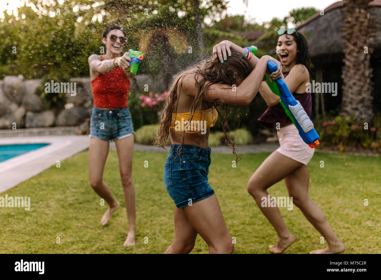 Women water fight hi-res stock photography and images - Alamy