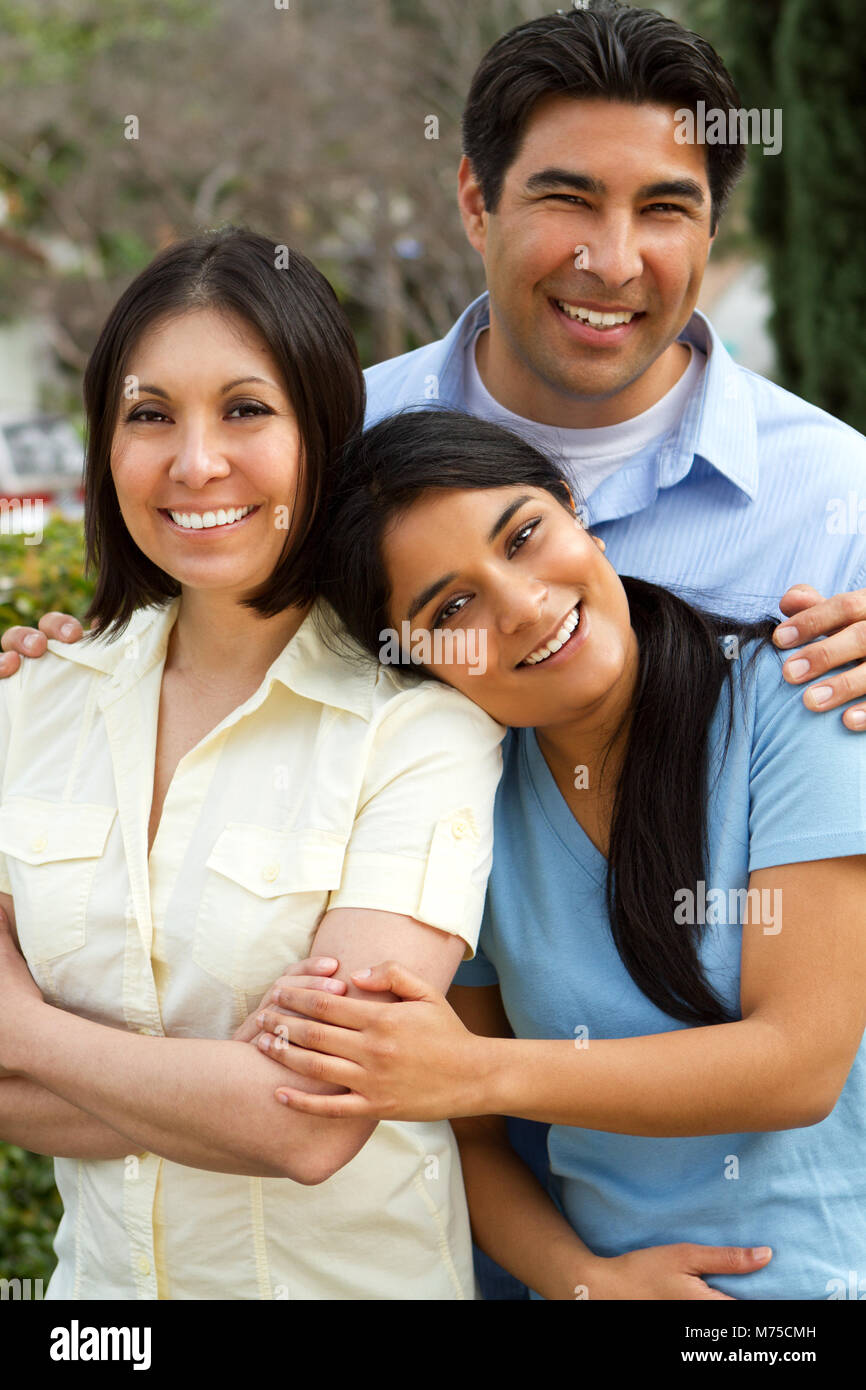 Hispanic family with a teen daughter Stock Photo - Alamy