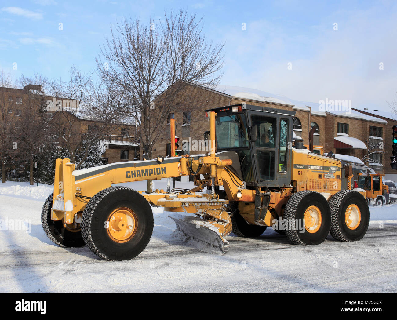 Snow plov clearing snow after storm Stock Photo - Alamy