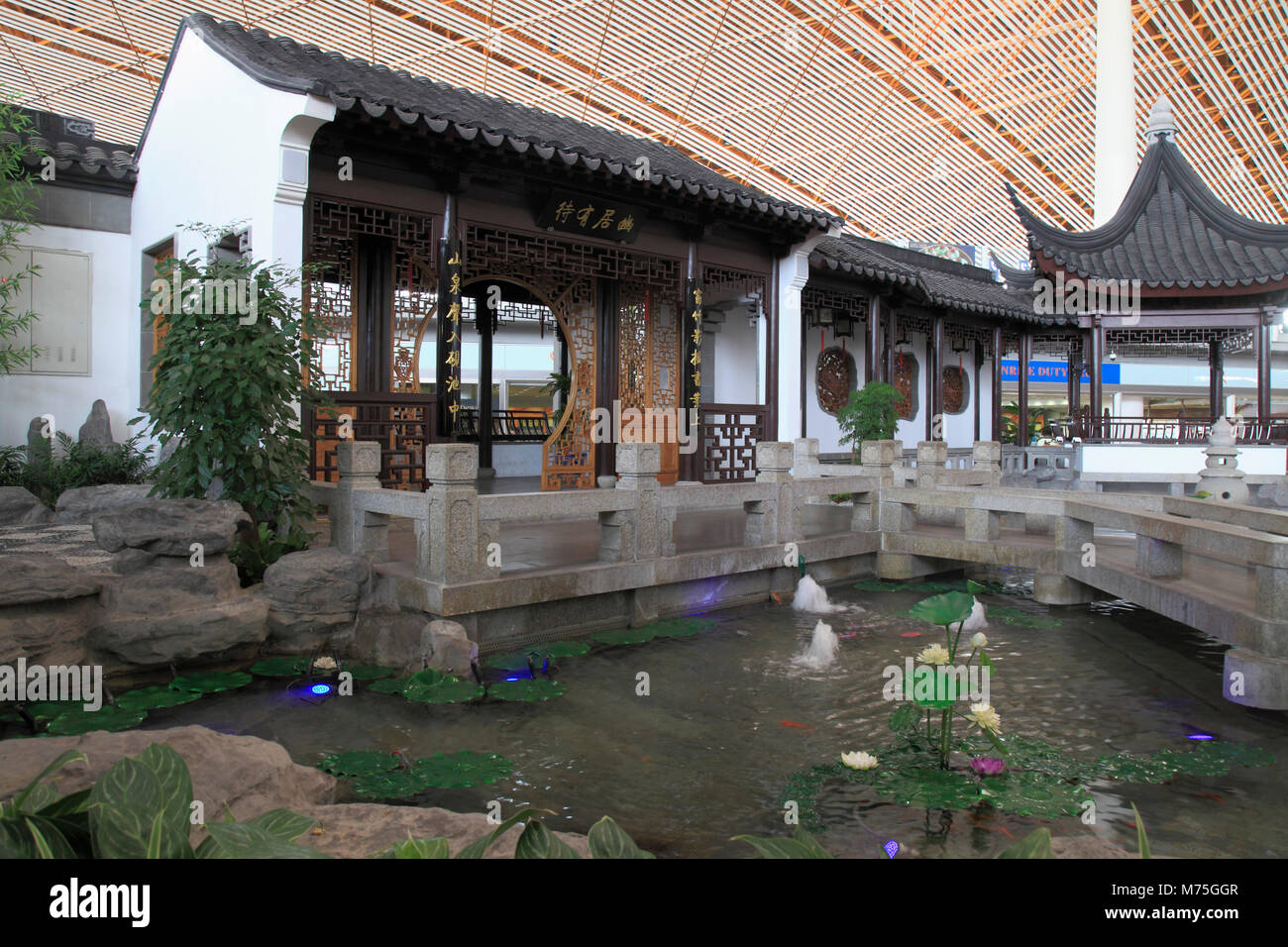 China, Beijing, Capital Airport, Terminal 3, interior, pavilion, pond ...