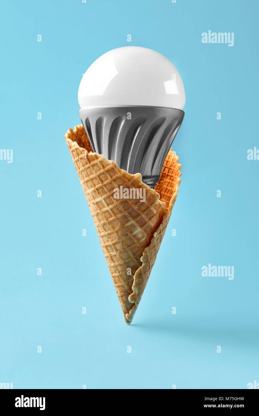 Led lamp in ice cream cone, innovation concept Stock Photo - Alamy