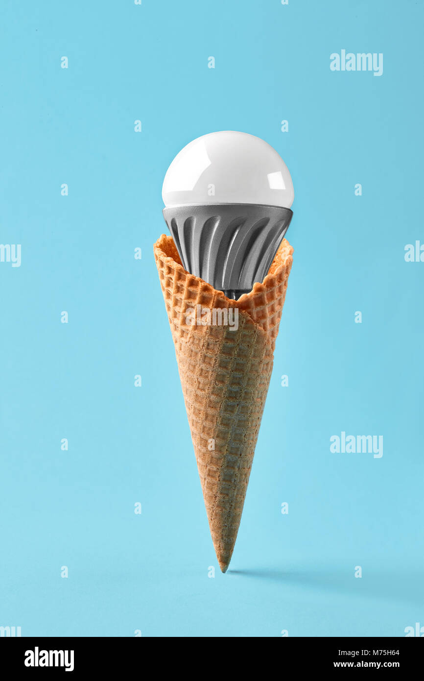Led lamp in ice cream cone, innovation concept Stock Photo - Alamy