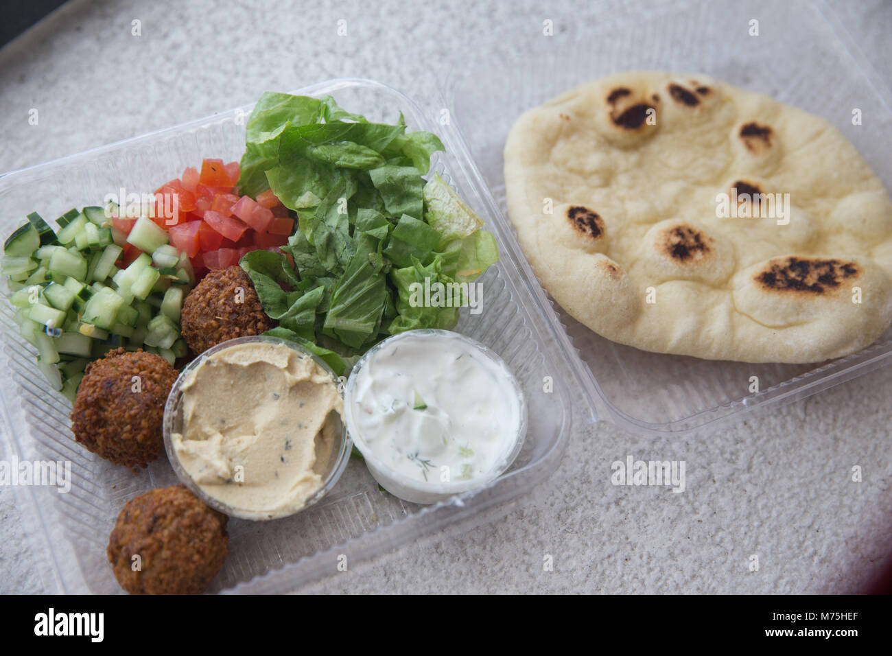 Falafel platter for to go Stock Photo - Alamy