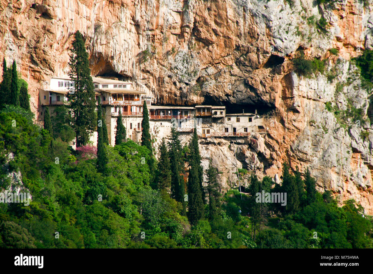 The stone monastery Philosopher inside the rock above the gorge and ...