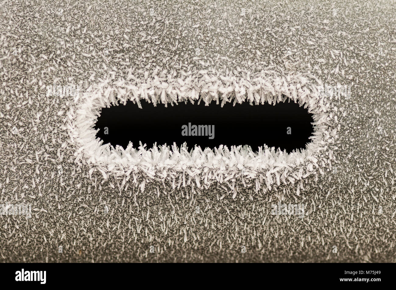 Ice art structures on frozen iron structures with a remarkble black ...