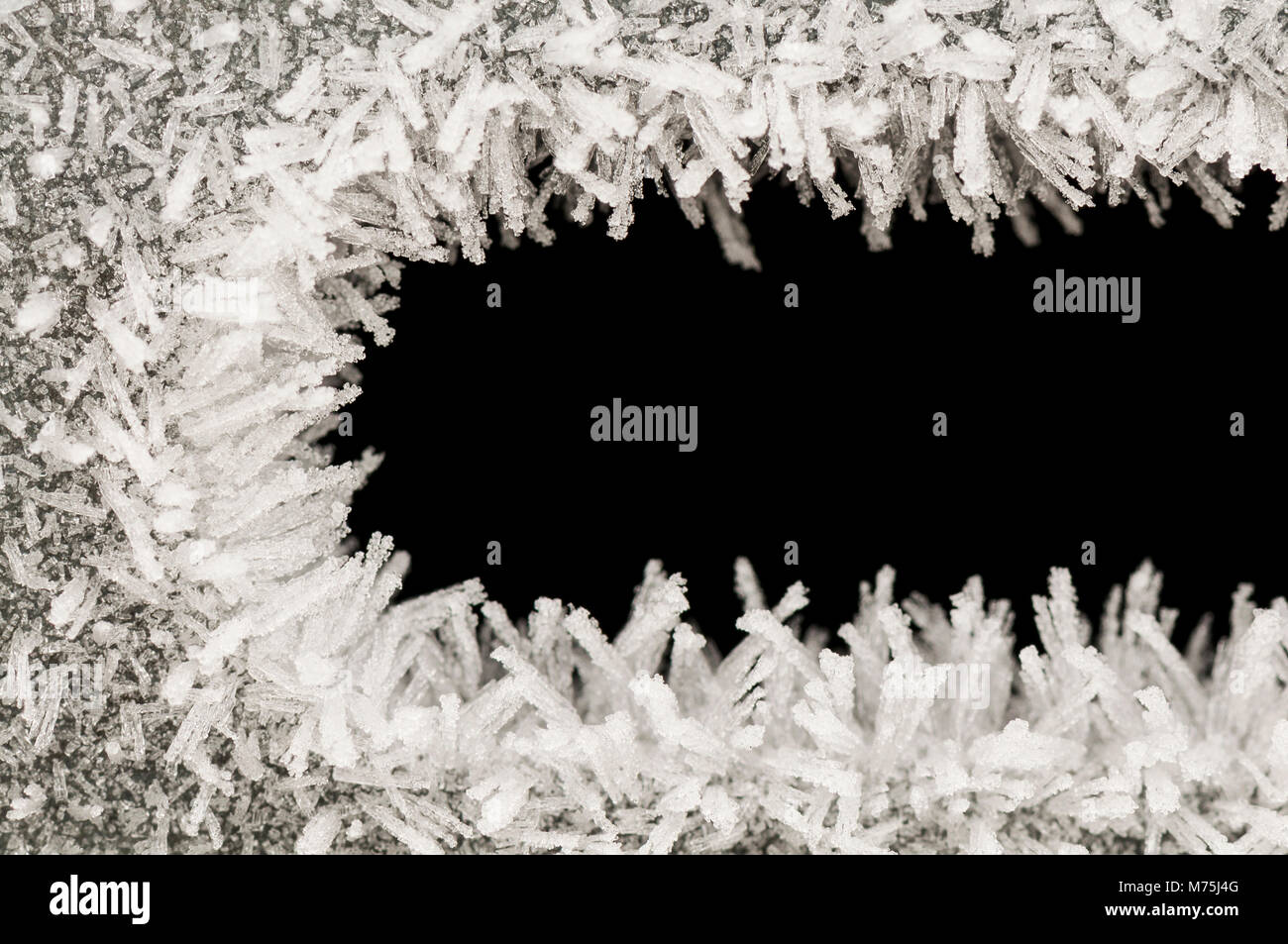 Ice art structures on frozen iron structures along the road Stock Photo ...