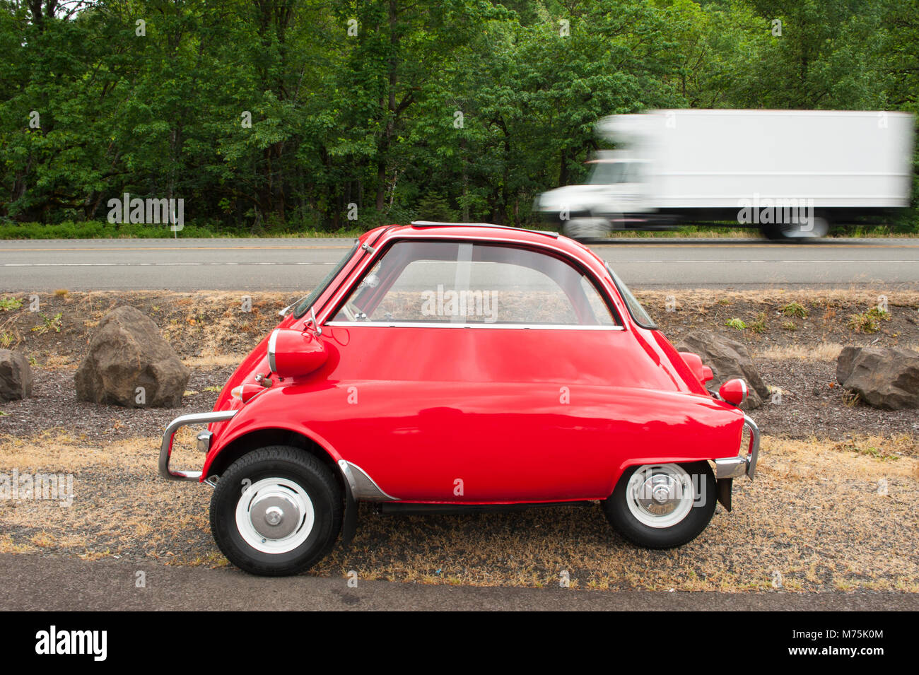 European microcar on an Oregon highway Stock Photo - Alamy