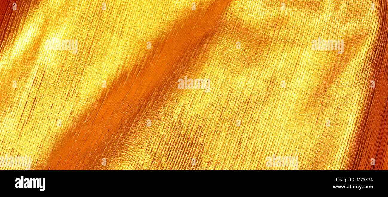 fabrics with golden color of pieces of leather working Stock Photo - Alamy