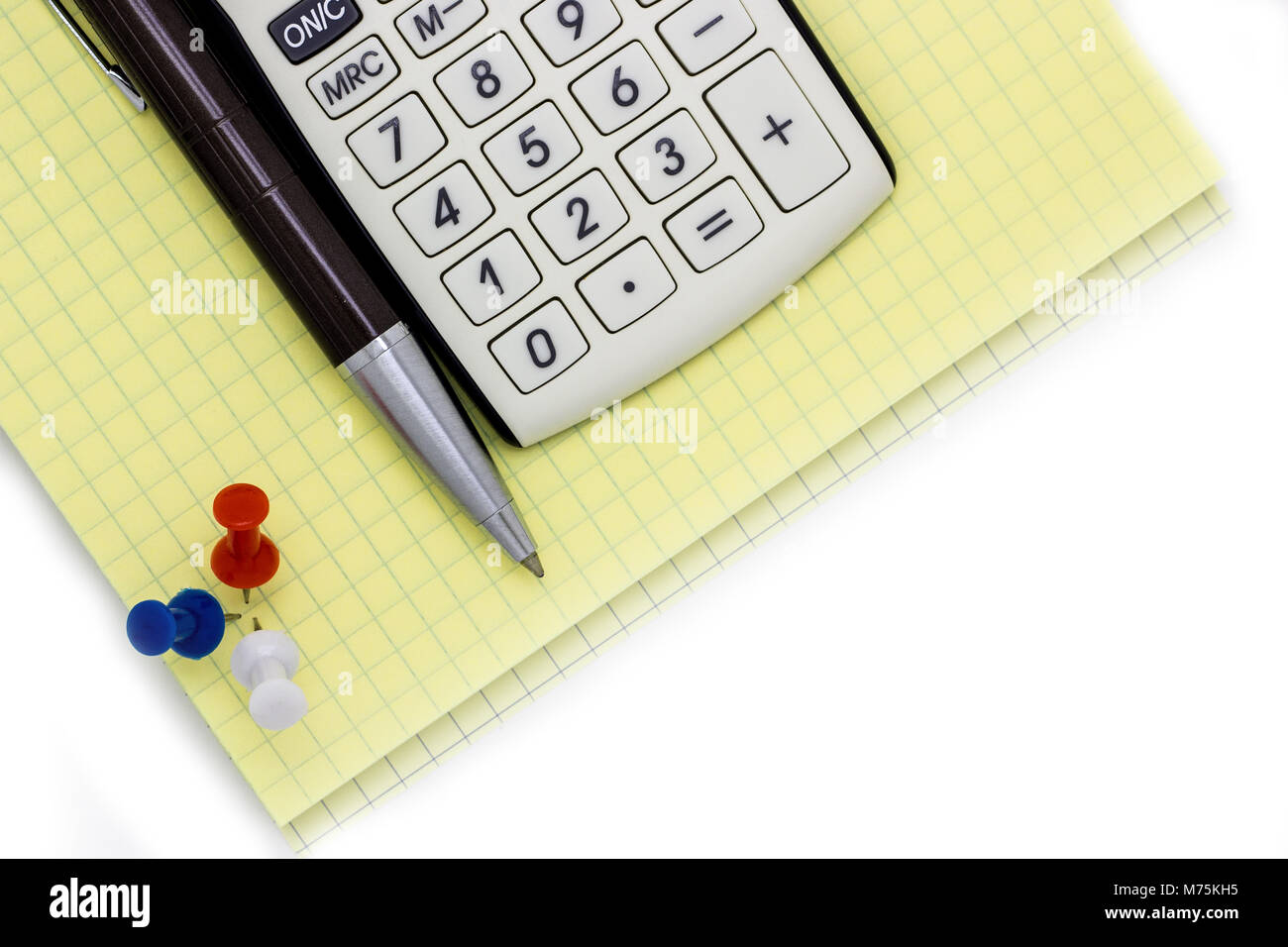 Calculator pen and notebook on white background Stock Photo - Alamy