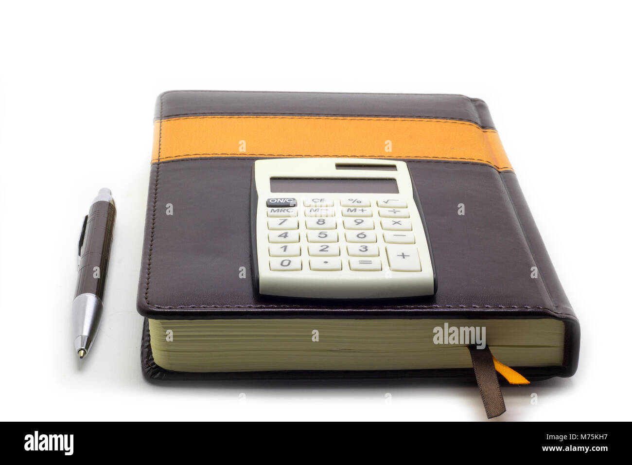 Calculator pen calendar on Cut Out Stock Images & Pictures - Alamy