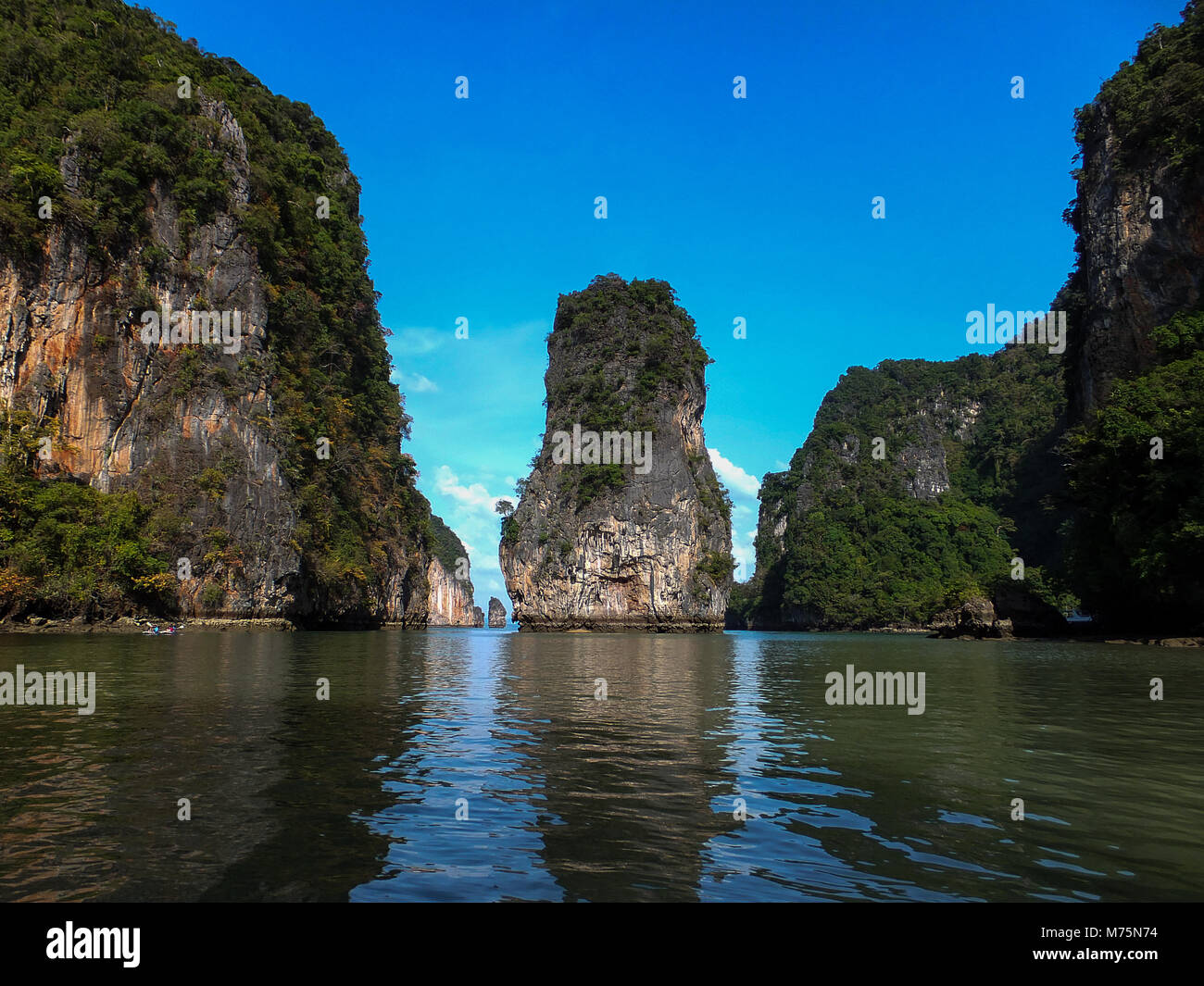 Colourful limestone karst rises out of the Andaman Sea, Phang Nga Bay ...
