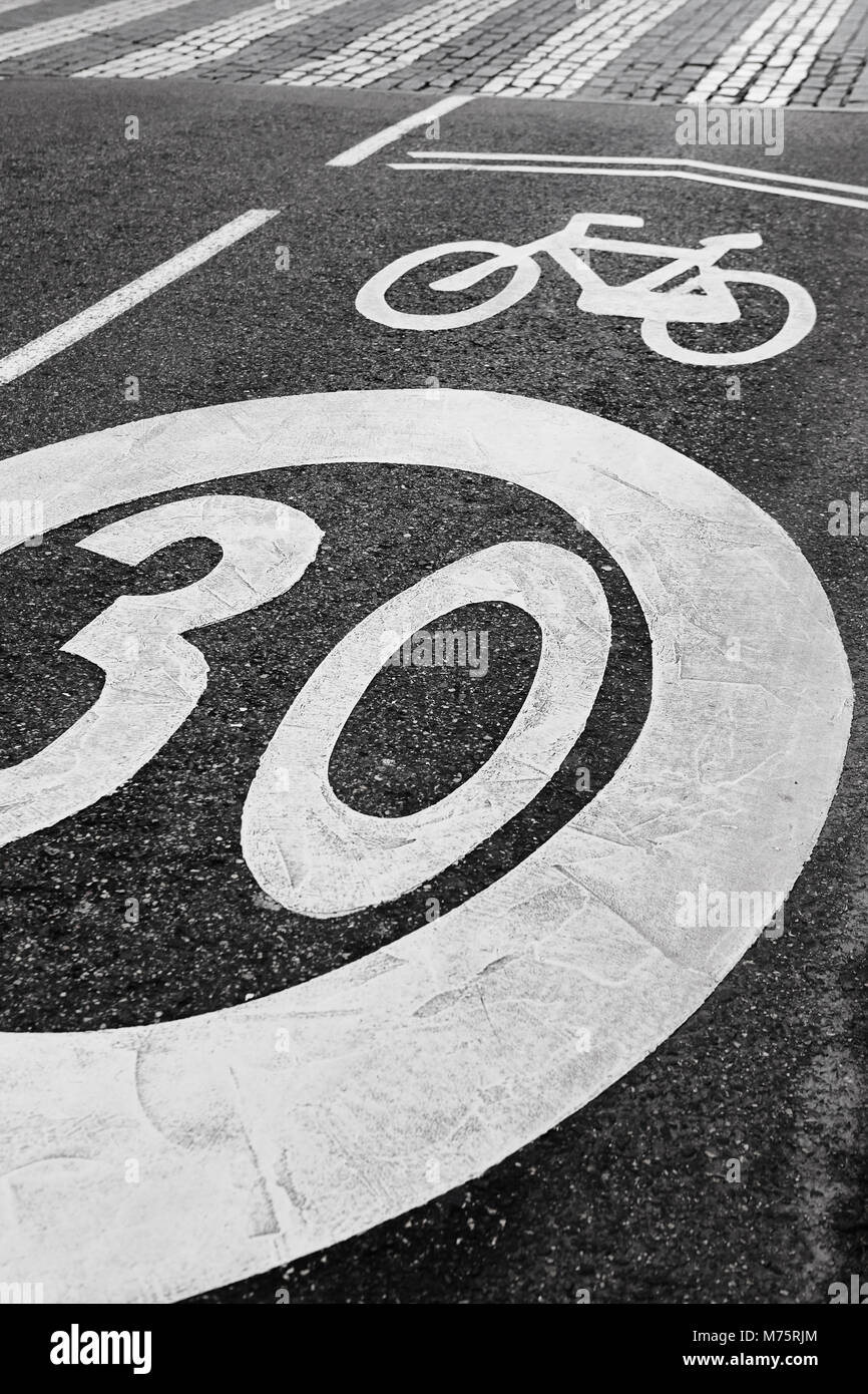 Bikes lane signal on an asphalt street. Urban background. Vertical ...
