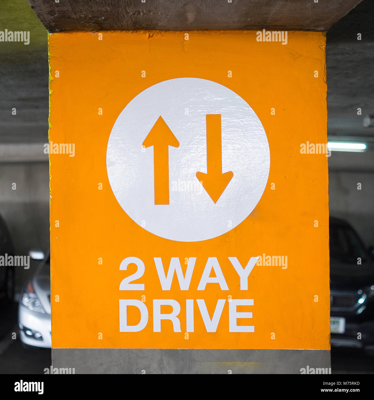 Signboard in parking lot arrow symbol hi-res stock photography and ...