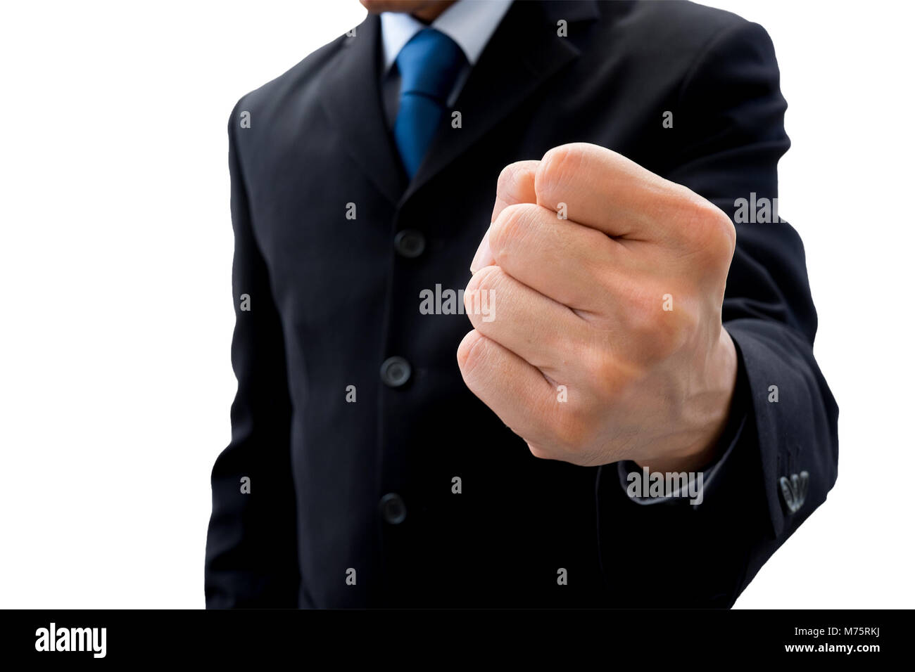 Businessman in dark gray suit raising his fist of success and victory ...
