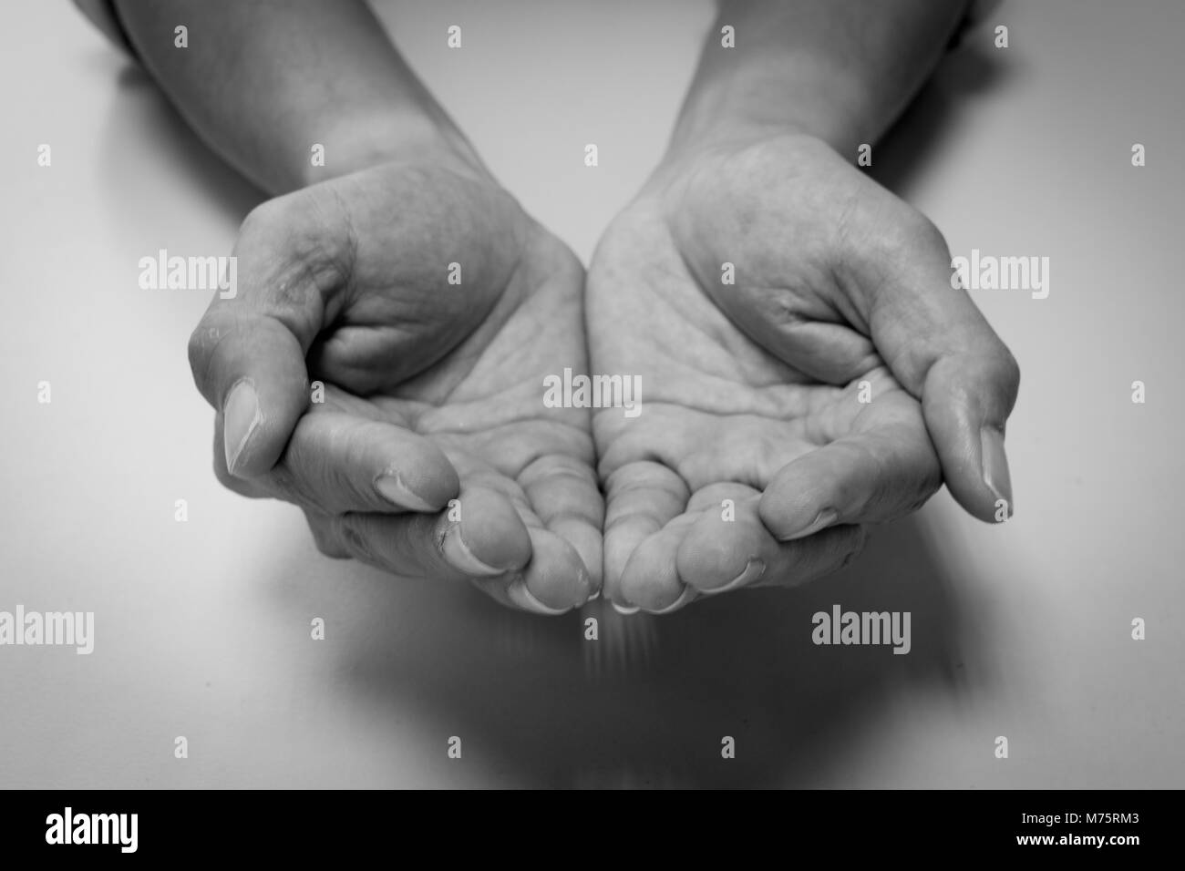 Hands Begging High Resolution Stock Photography and Images - Alamy