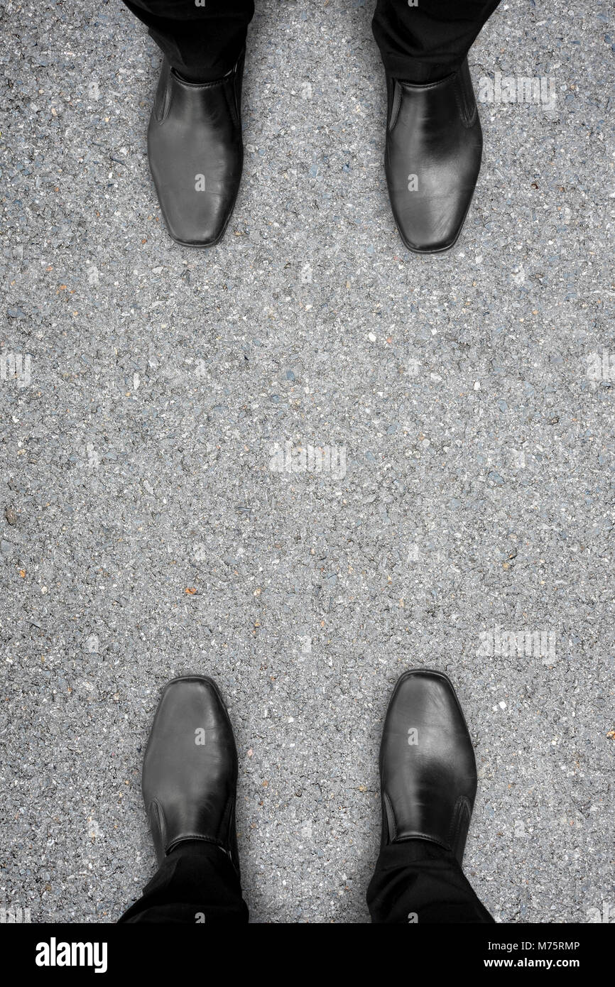 Two people standing opposite each other hi-res stock photography and ...