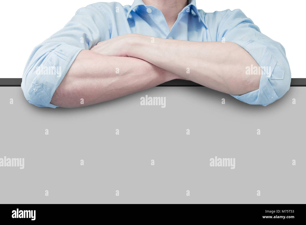 Isolated boss crossing one arm at office partition looking at his ...