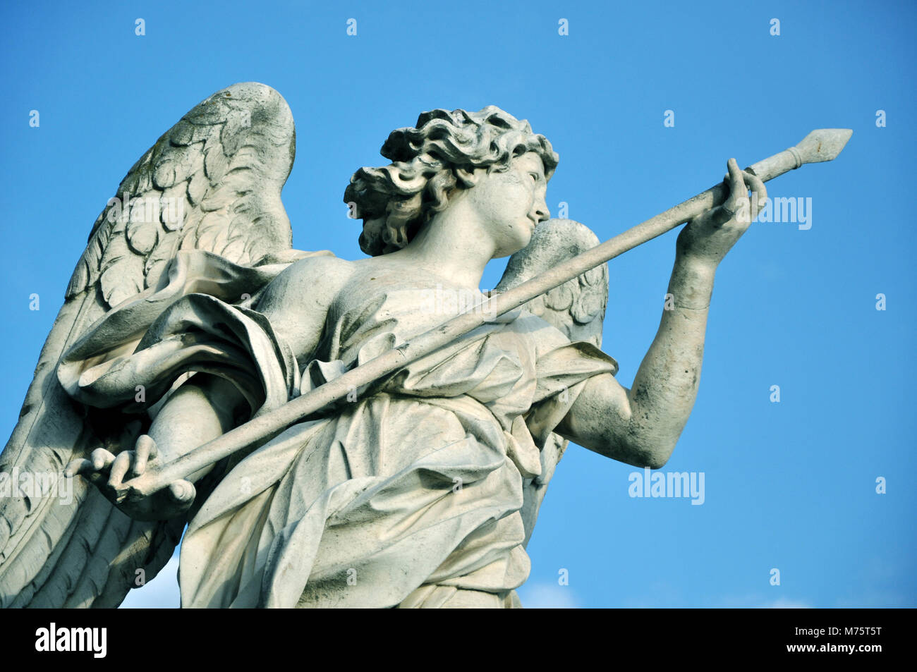 Marble statue of angel holding the Holy Lance of Longinus. Sant'Angelo ...